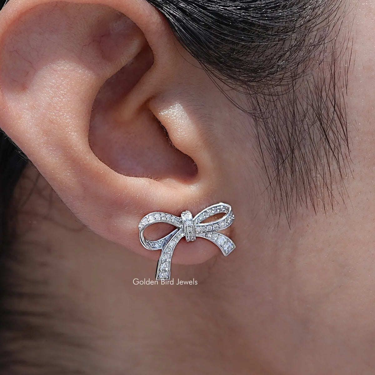 silver bow earrings